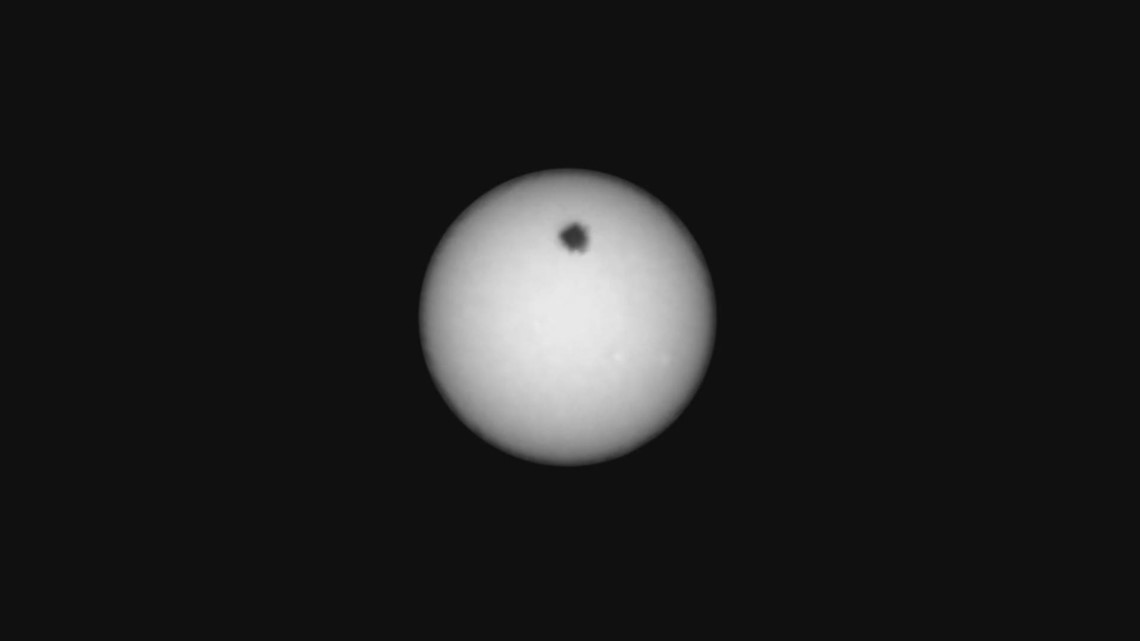 Deimos passes in front of sun during solar eclipse on Mars | 11alive.com