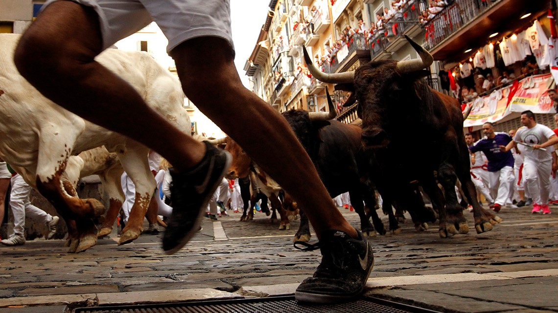 1 gored, 4 more injured on second day of Pamplona bull run | 11alive.com