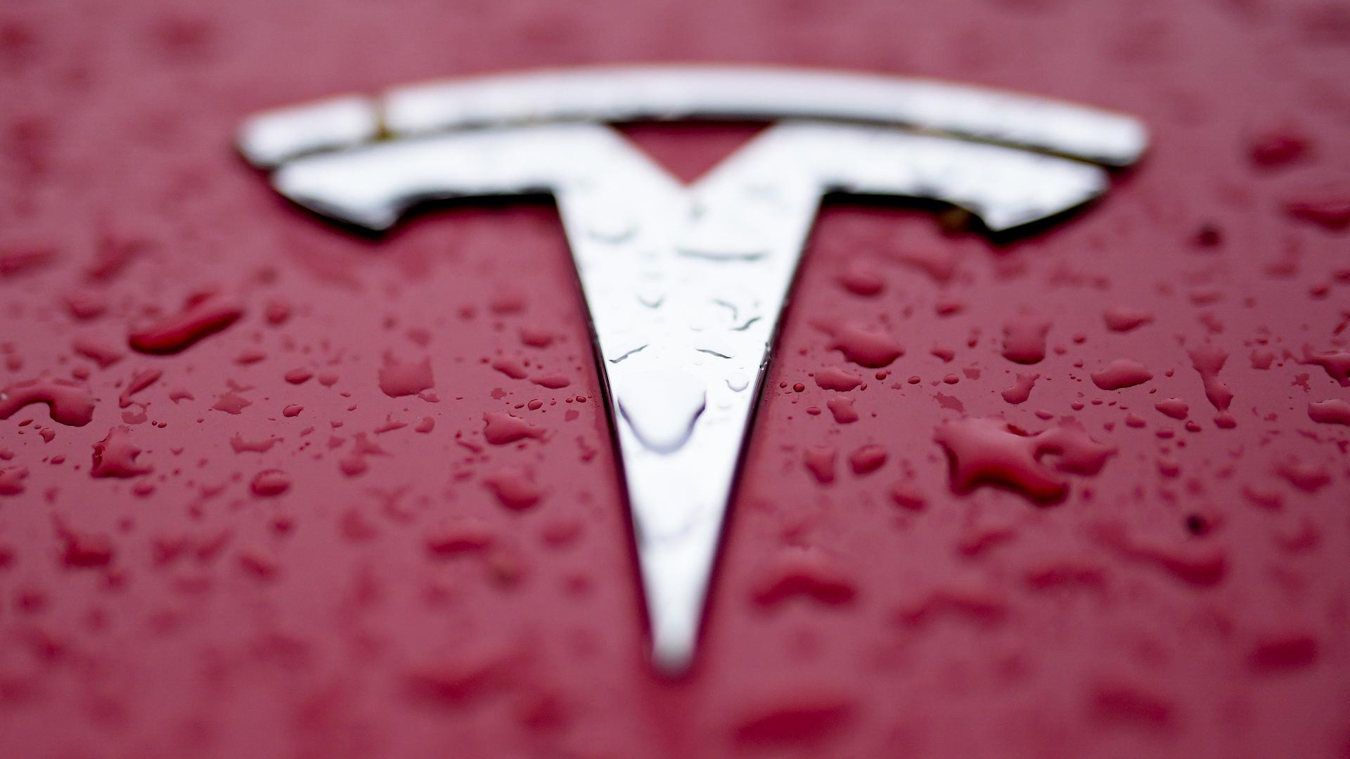 Tesla stock falls more than 7% after 1st annual sales decline in a ...