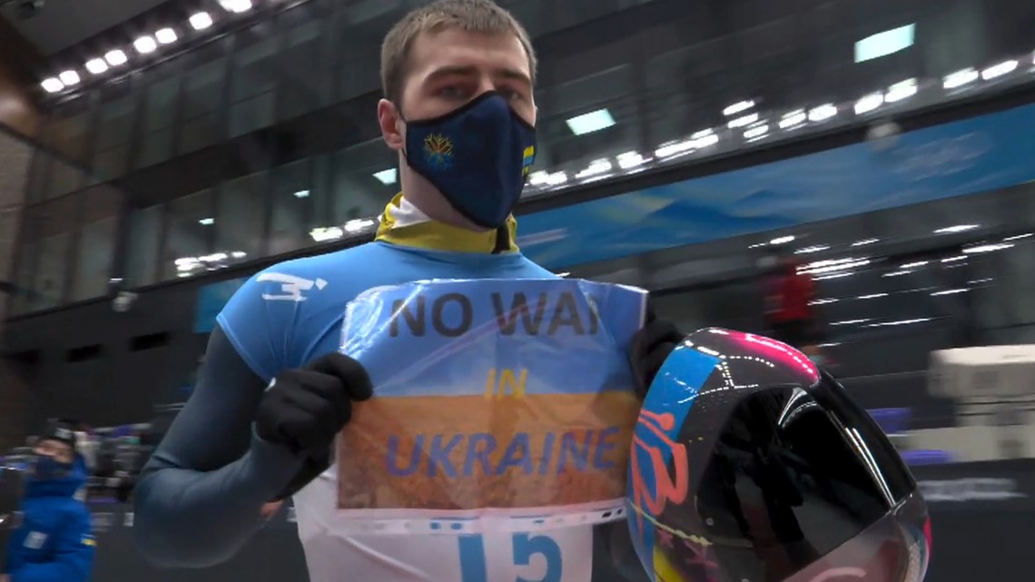 Skeleton racer unveils 'No war in Ukraine' sign at Olympics | 11alive.com