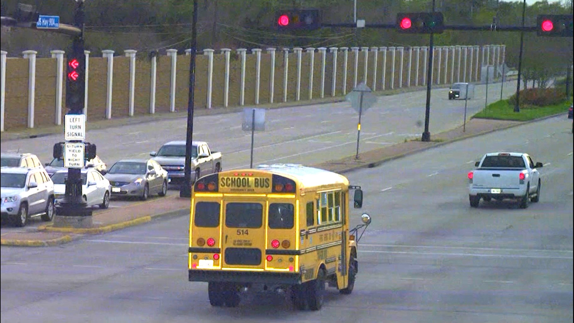 Caught on camera: School buses running red lights | 11alive.com