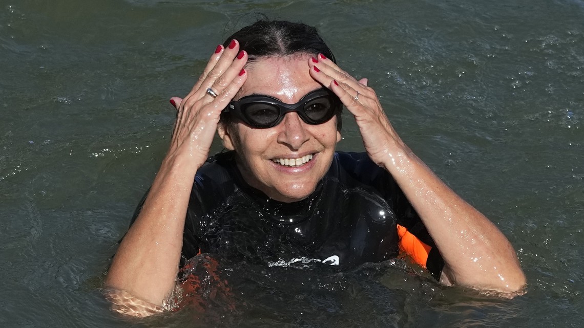 Paris mayor swims Seine River | 11alive.com