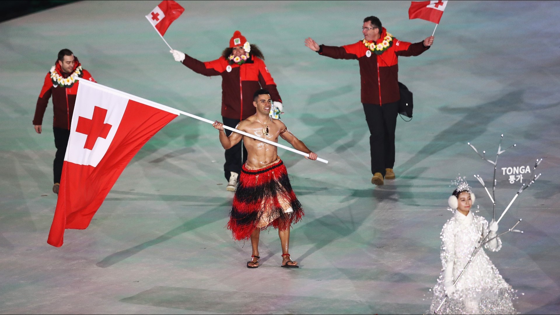 Tonga's flag bearer is shirtless again - and it's freezing at the ...