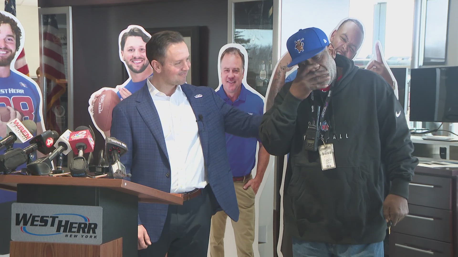 West Herr gifts Bills mailroom employee Slick Rick a car | 11alive.com