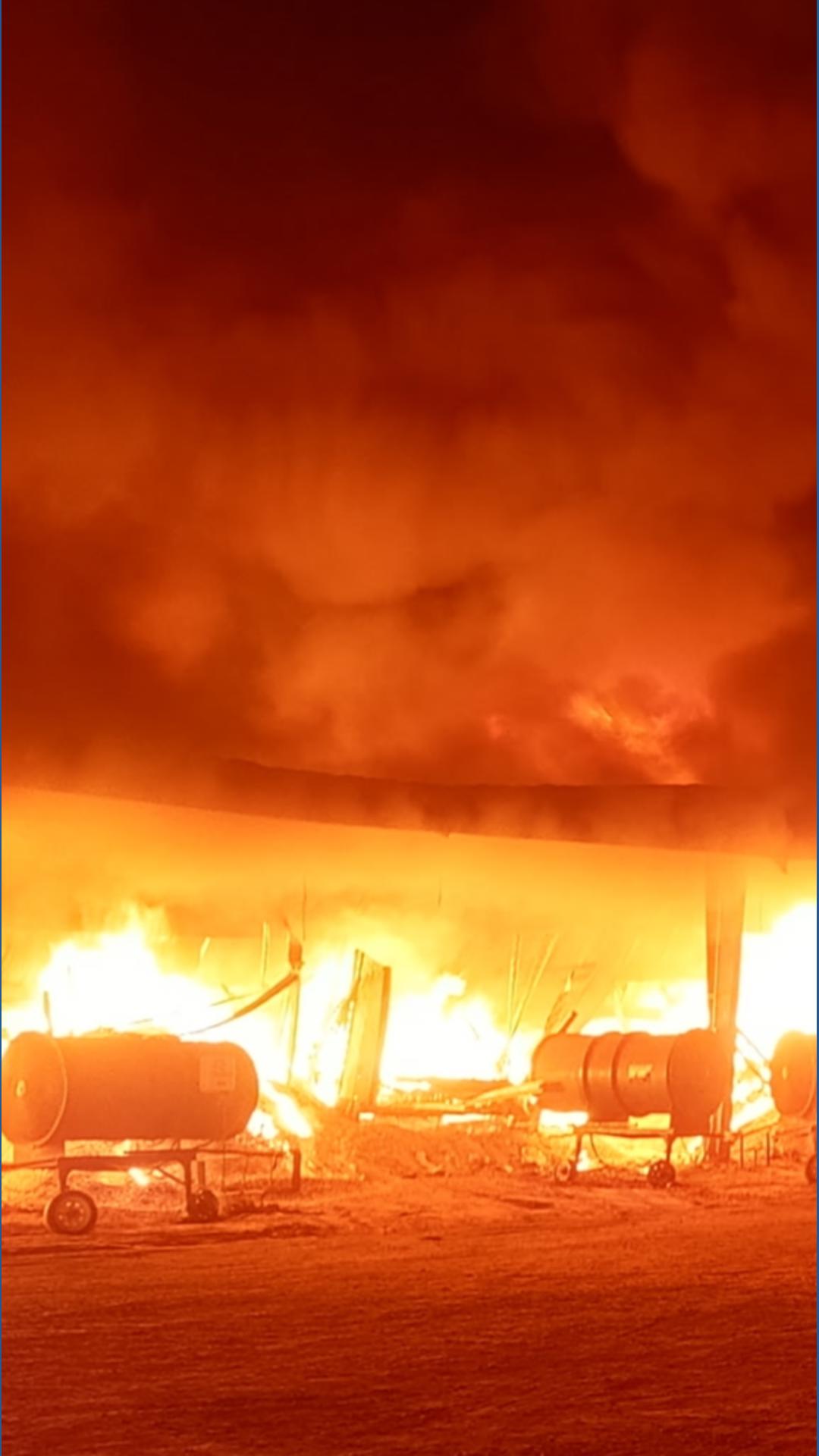 Rochelle peanut facility fire rages as crews battle | 11alive.com