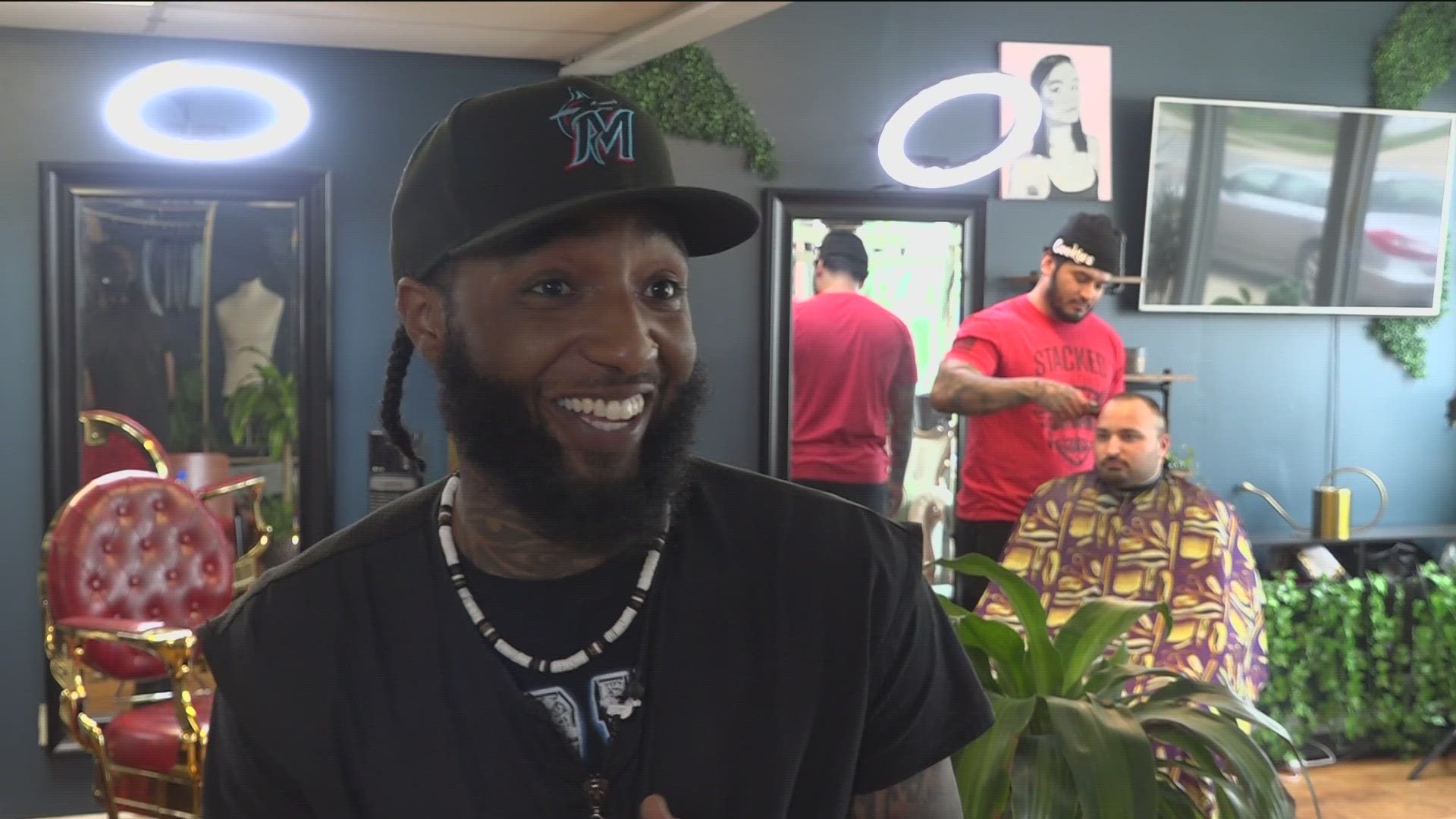 Local barber gives free haircuts to people in need, goes viral ...
