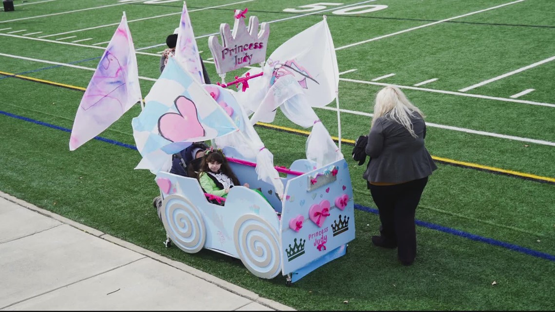 Students build special Halloween costume for girl in wheelchair ...