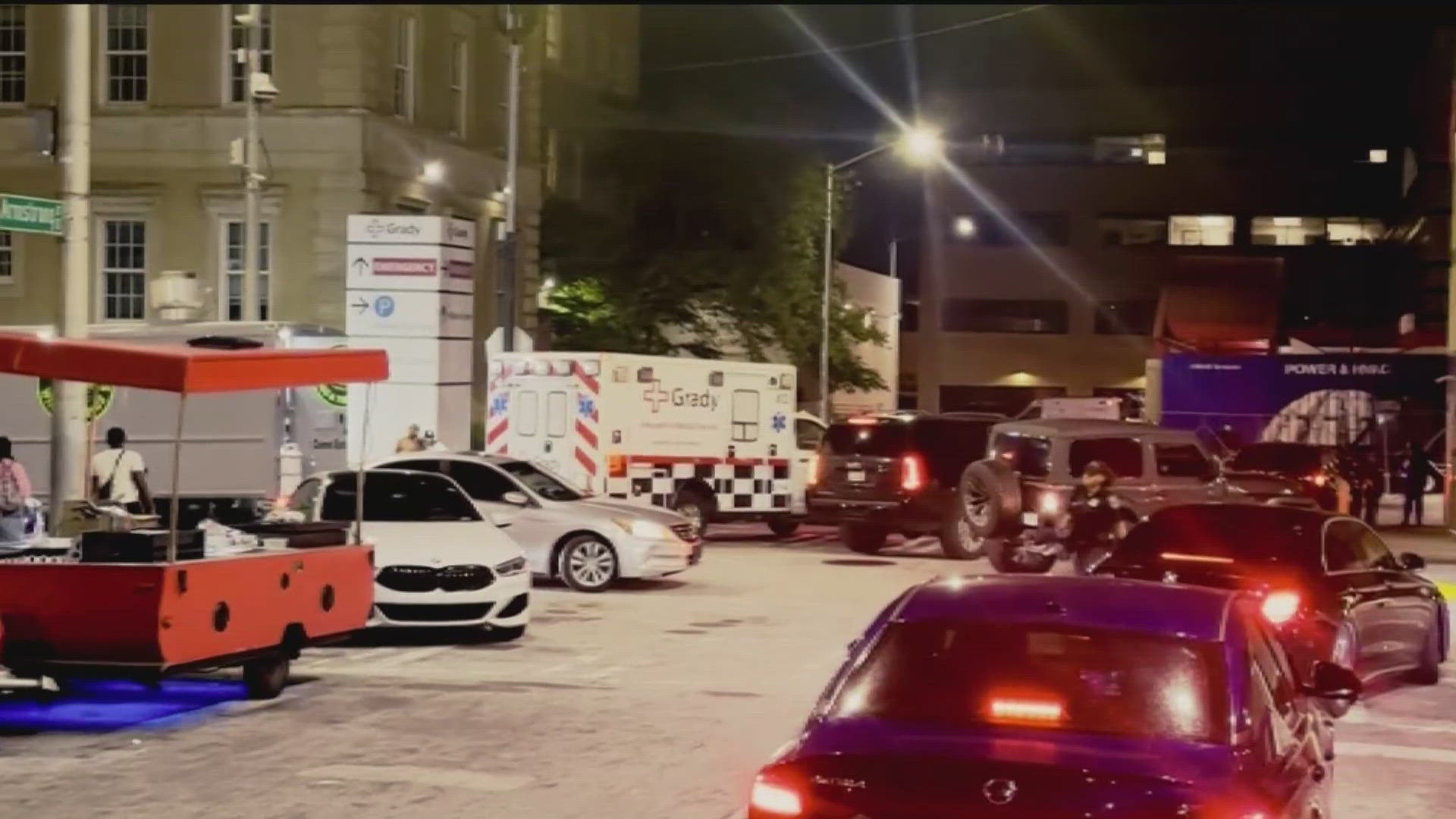 Ambulances slowed by food trucks, parked cars outside Grady ER raise ...