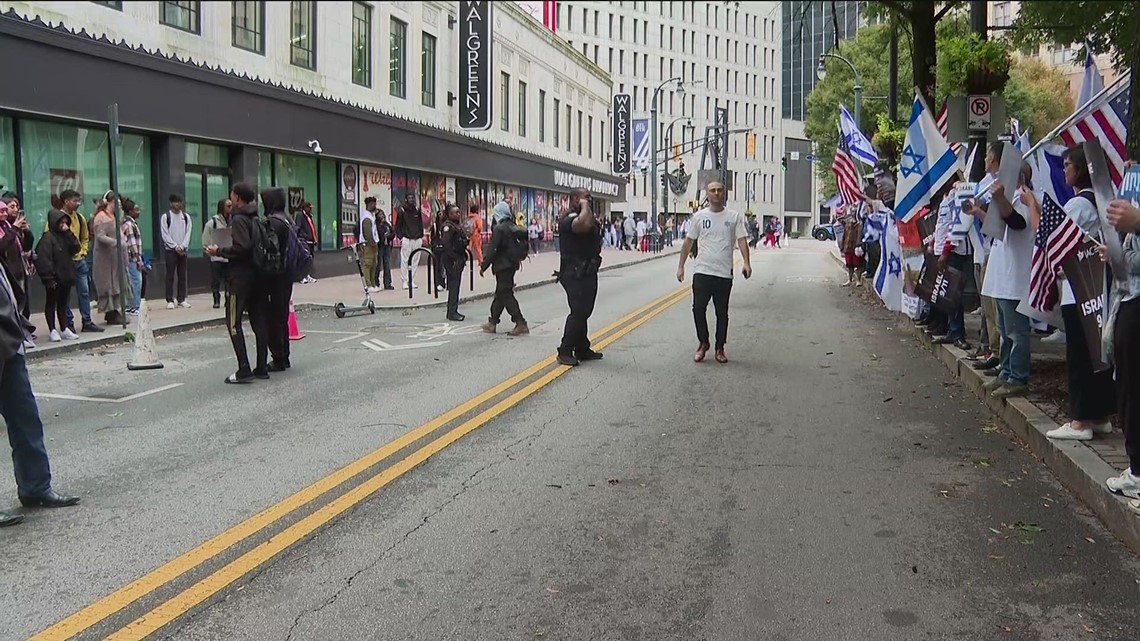Dueling protests in downtown amid Hamas-Israel war | 11alive.com