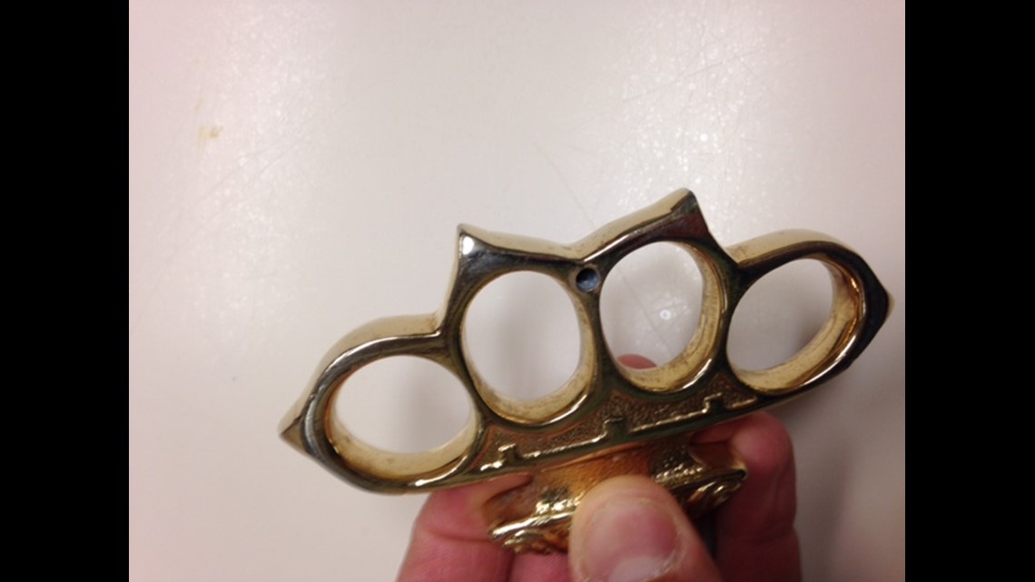 Police: Gang member punches K9 officer with brass knuckles | 11alive.com