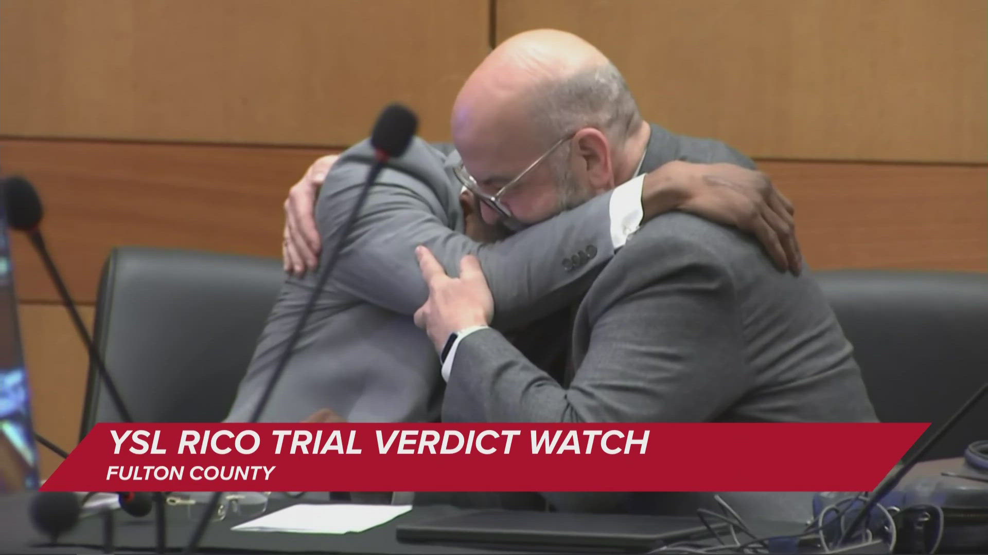 Deamonte Kendrick aka Yak Gotti and lawyer hug after not guilty verdict ...