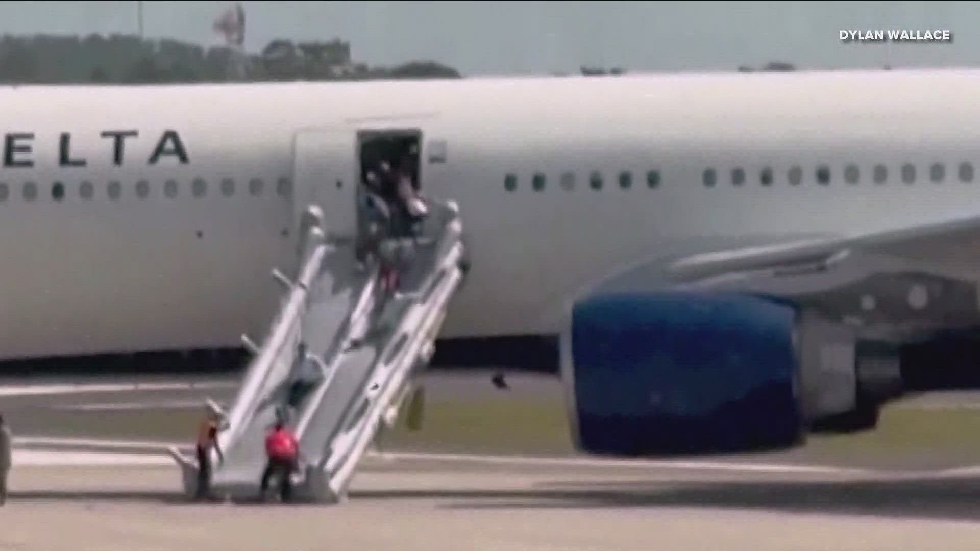 Atlanta family recounts chaos after Delta plane catches fire in Orlando ...