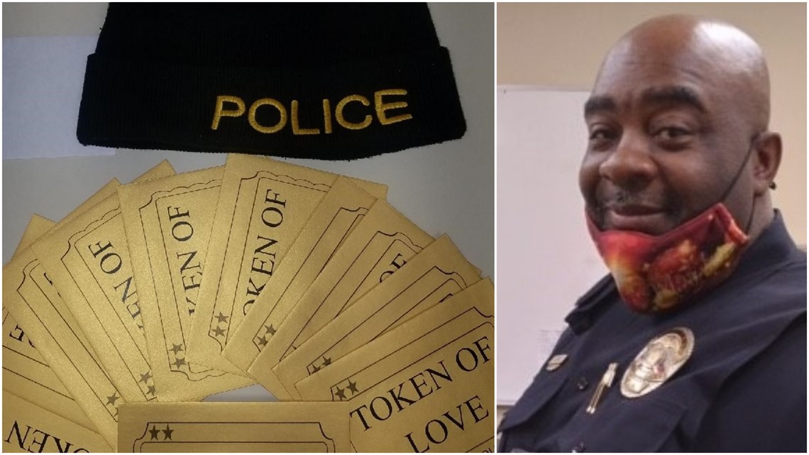 Hapeville Police Sgt. James Carroll gives money to needy families ...