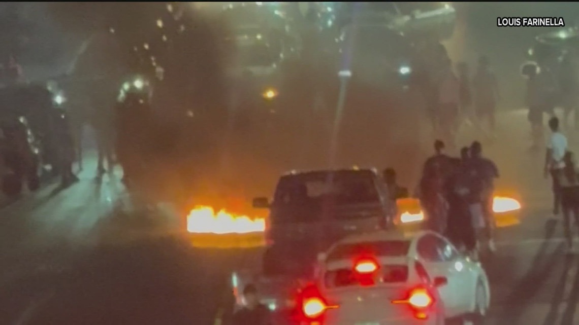 Fire, smoke, and fireworks block traffic during street takeover ...