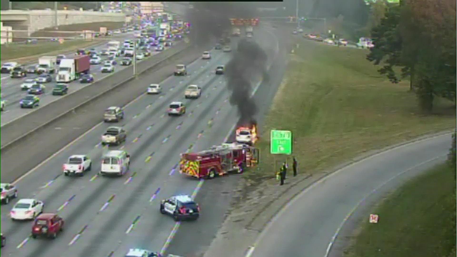 Watch crews put out car fire on I-75 at Highway 5 | 11alive.com