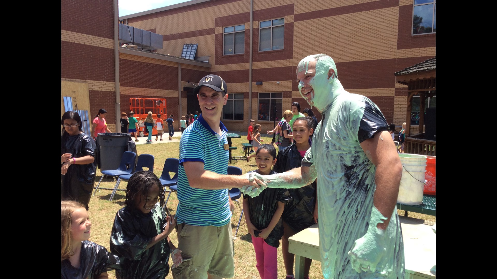 Students slime principal as reward for reading | 11alive.com