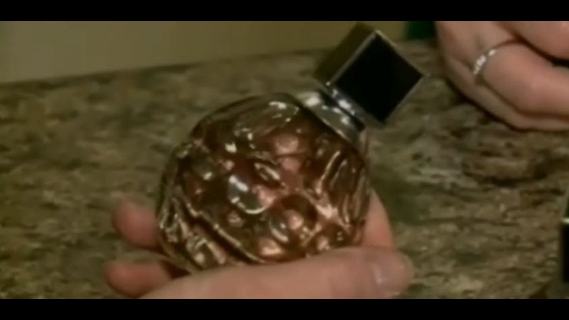 TSA confiscates perfume bottle shaped like grenade | 11alive.com