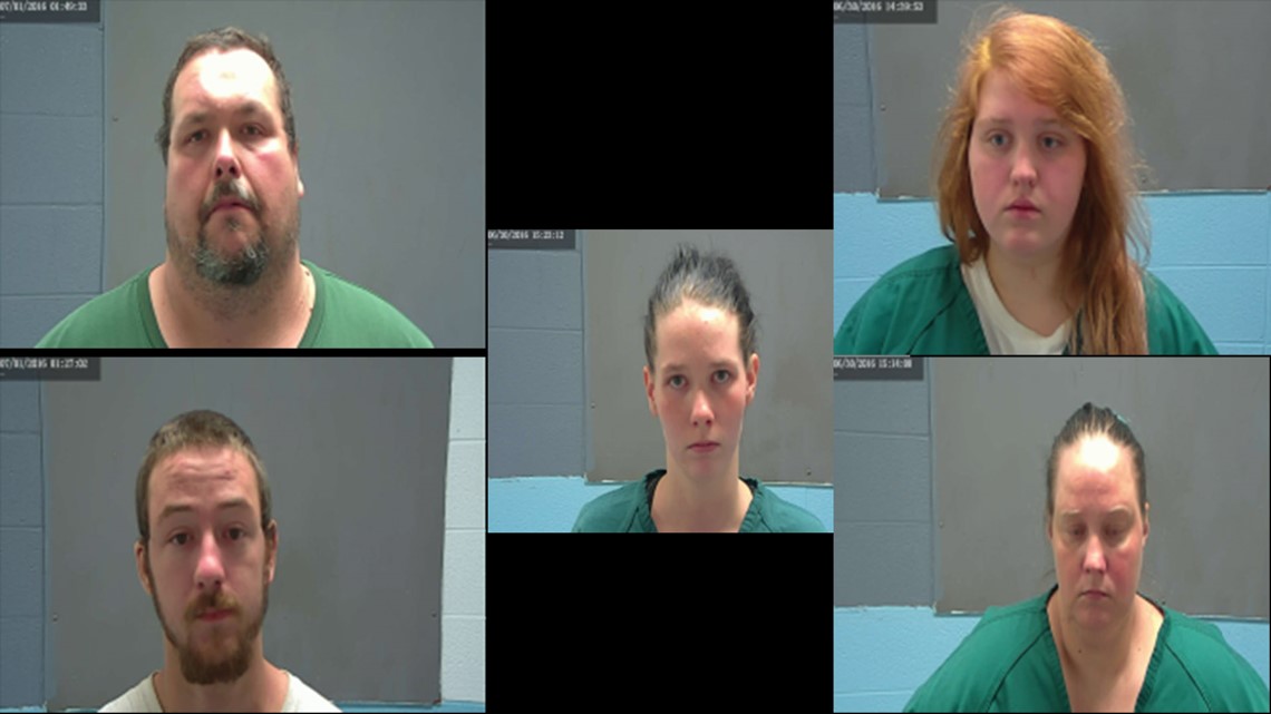 PHOTOS: 5 arrested after woman found in cage | 11alive.com