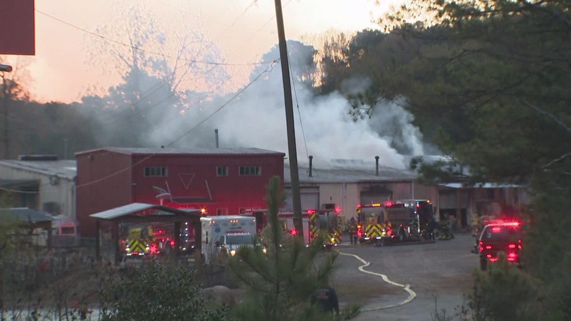 Firefighter battling warehouse fire in DeKalb County | 11alive.com