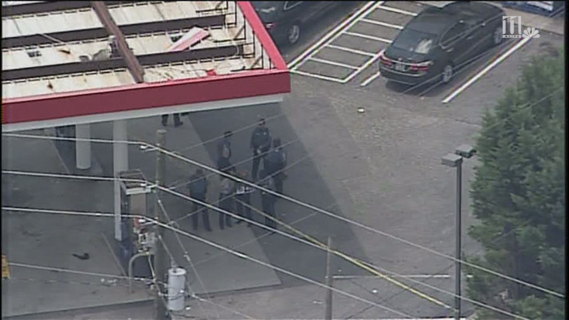 CRIME SCENE | Photos from Exxon shooting | 11alive.com