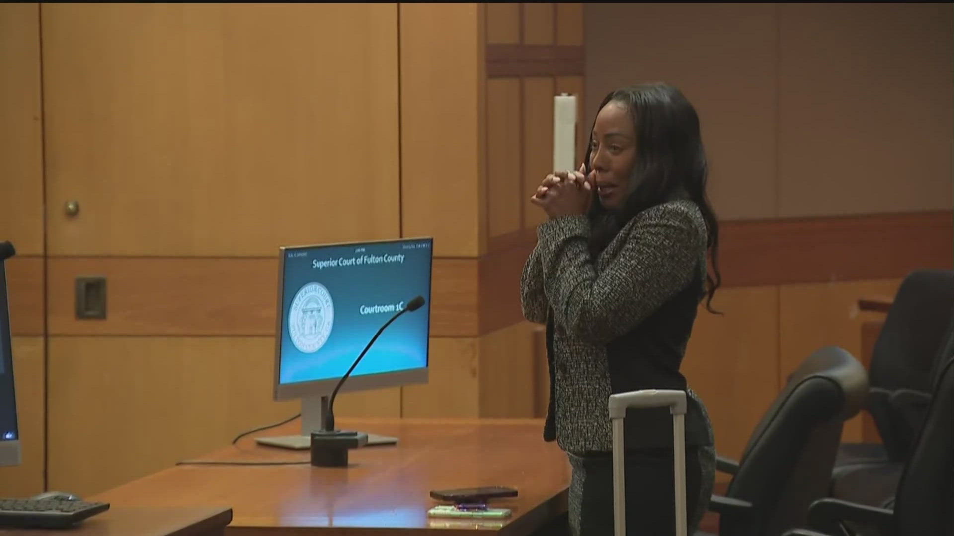 Representing herself, former Douglas County judge found not guilty for role in fight outside ...