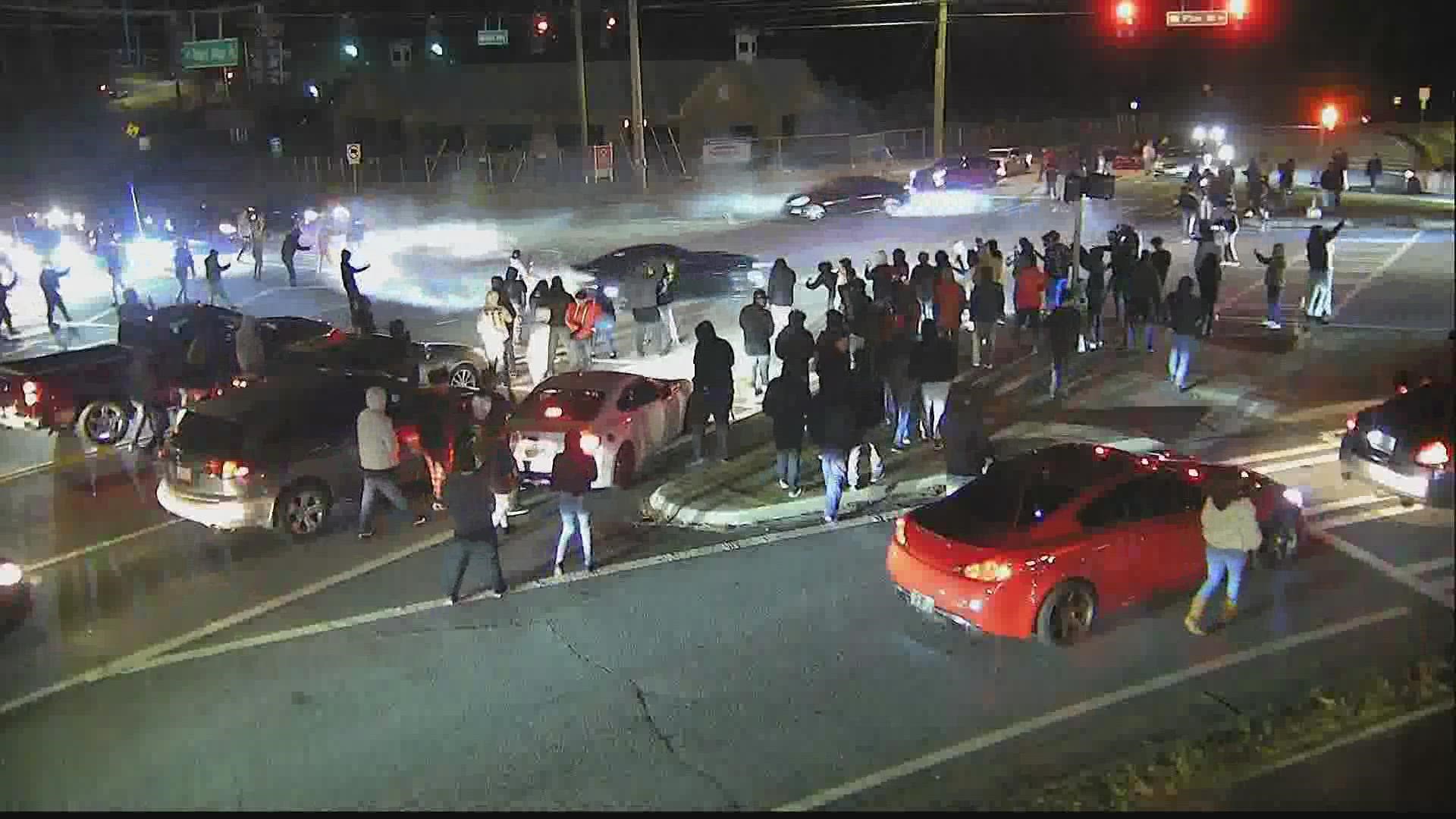 Drivers laying drag caught on video in Duluth, warrants issued ...