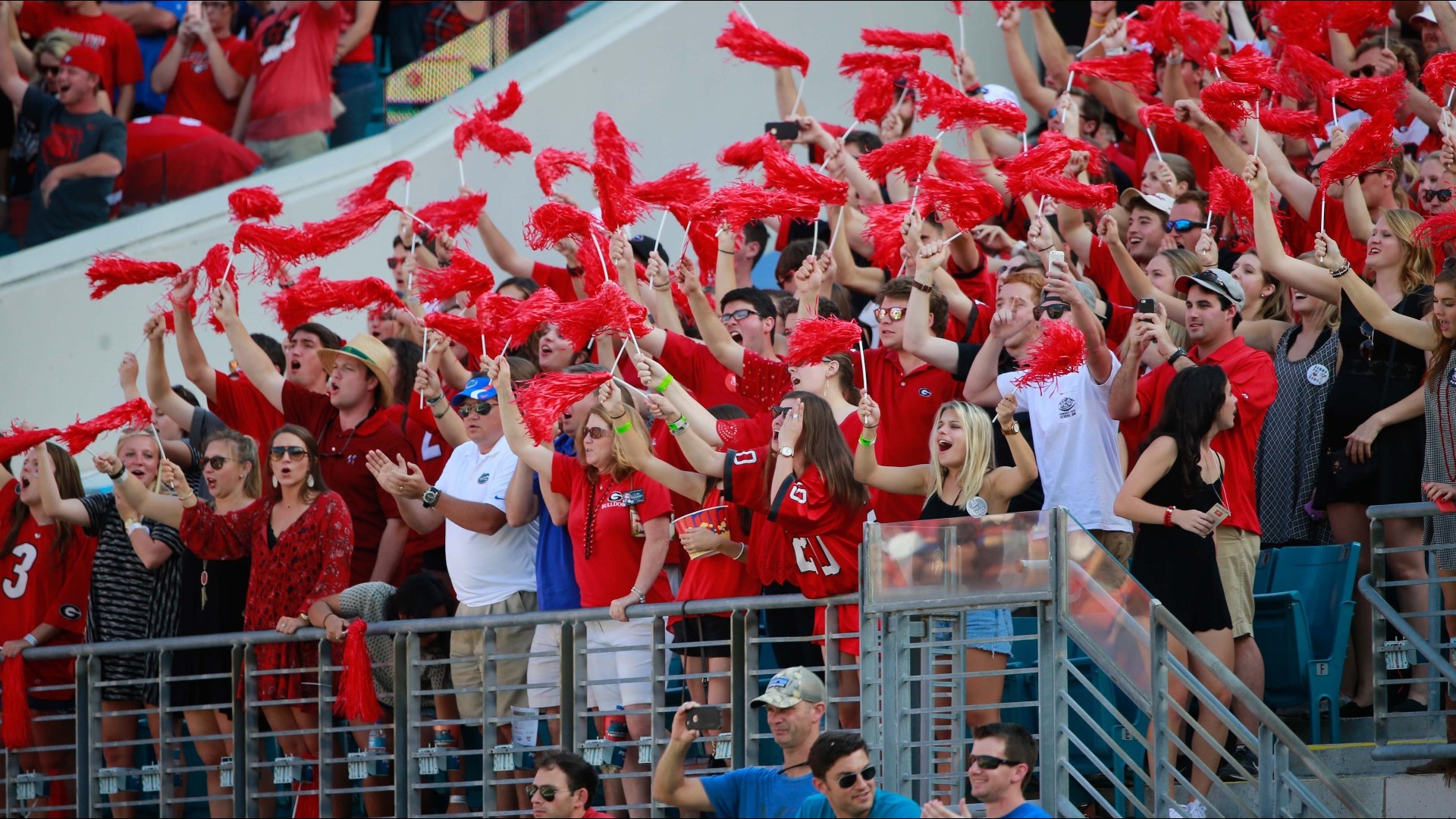 UGA fan puts head through window, keeps celebrating | 11alive.com