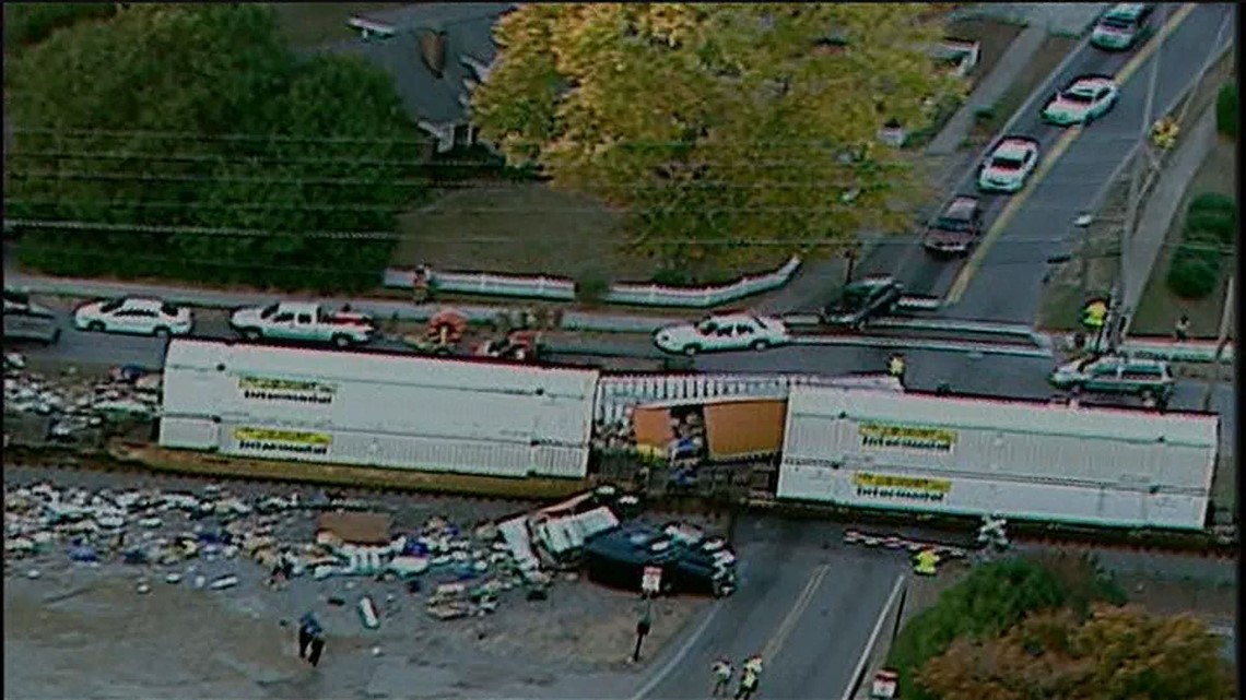 Crash Between Train Tractor Trailer Flings Debris Into Intersection