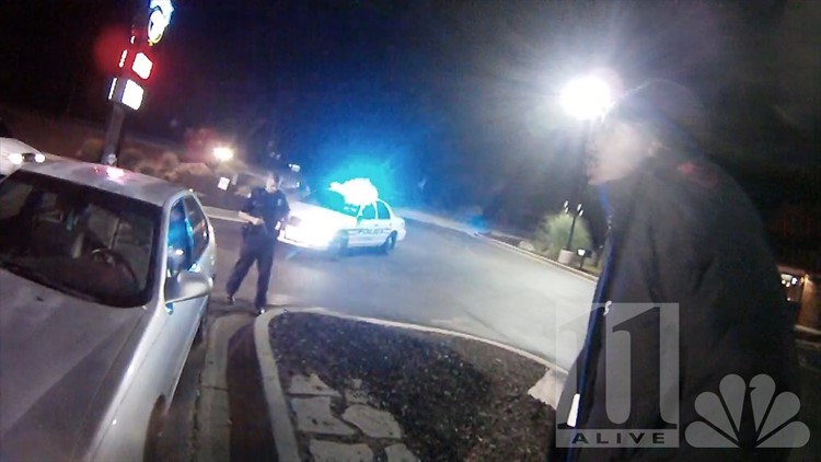 Body cam captures sudden moment suspect turns on cops in traffic stop ...