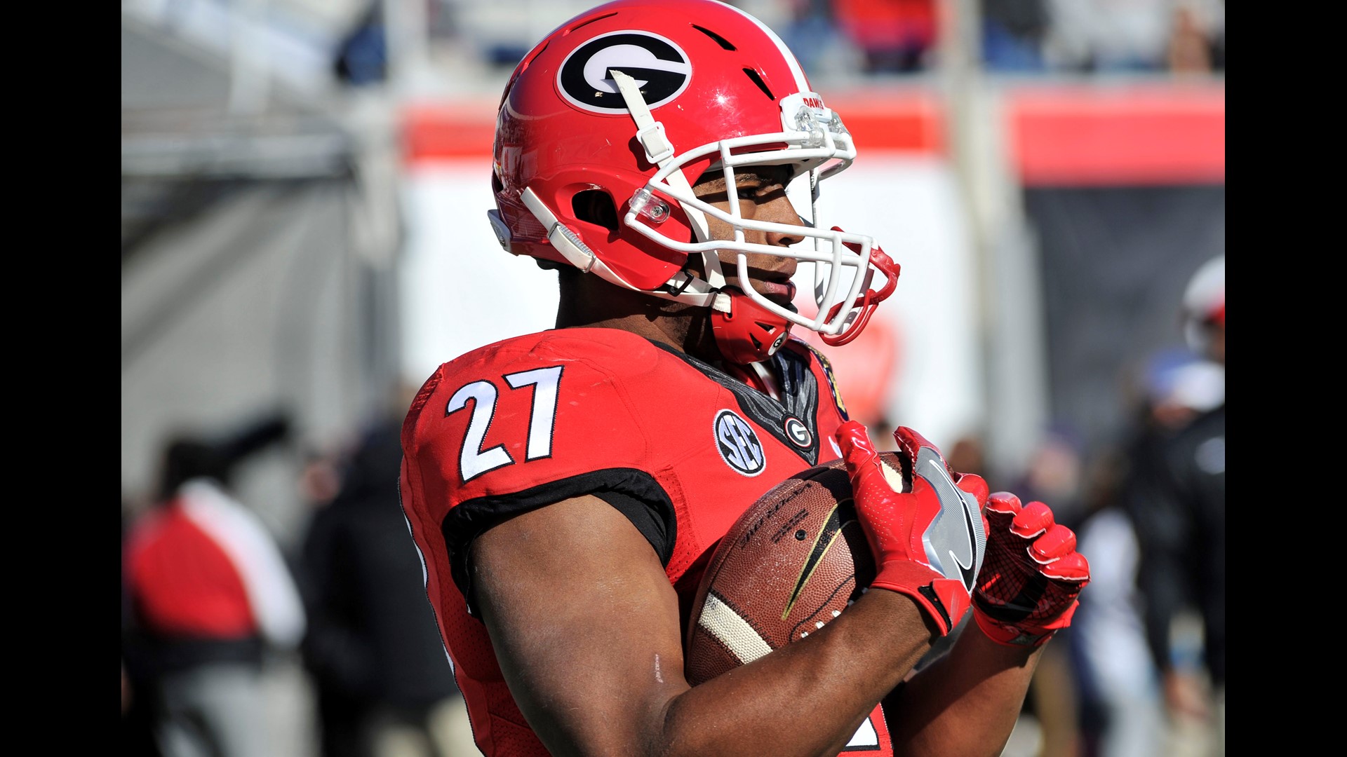 UGA RB runs into young fan wearing his jersey at random gas station ...