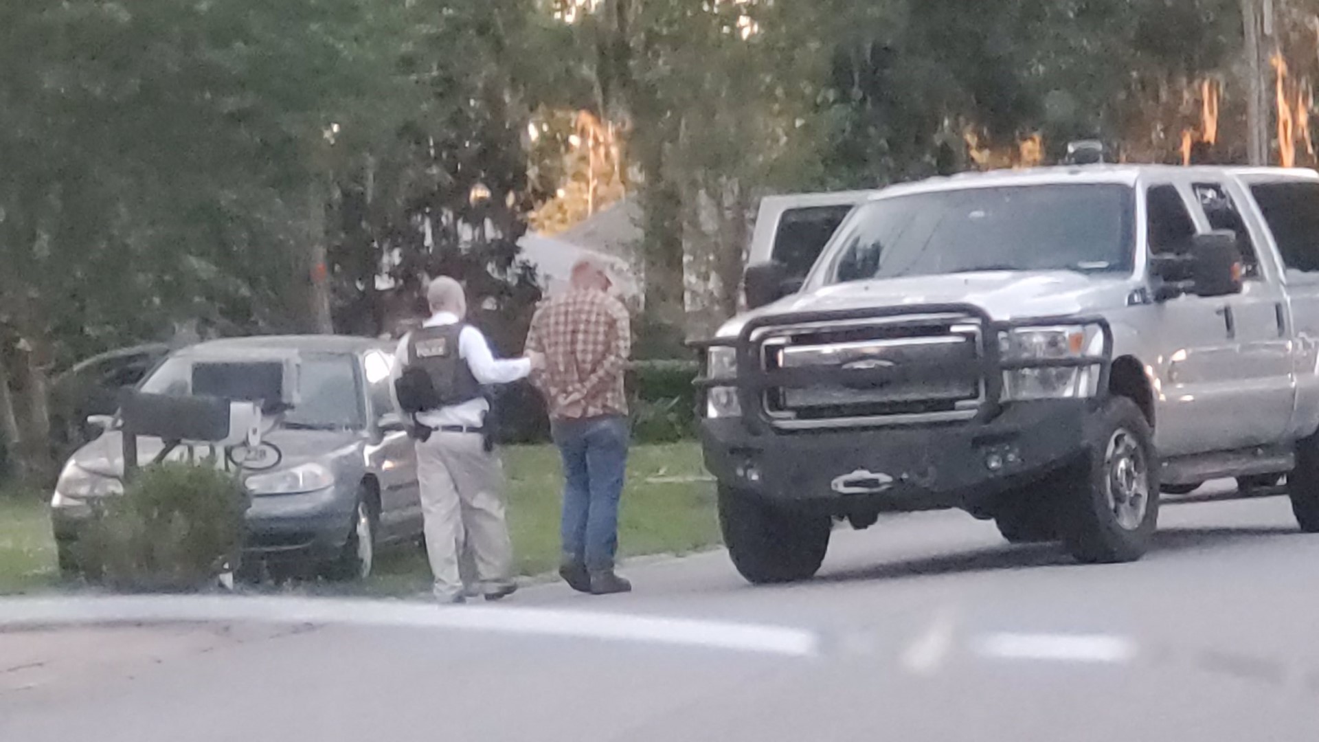 Photos: Gregory and Travis McMichael arrested | 11alive.com