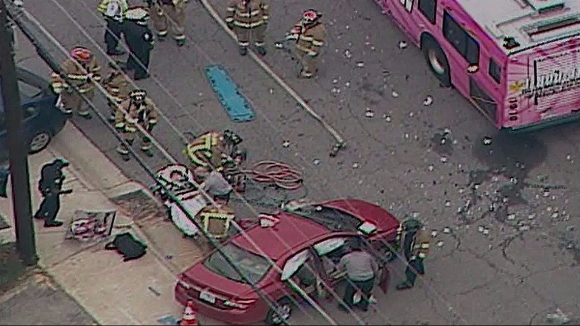 Woman trapped in car after crash with Marta bus | 11alive.com