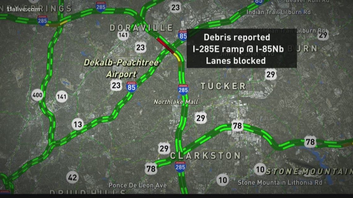 Truck hits median, tears concrete off wall near Spaghetti Junction ...