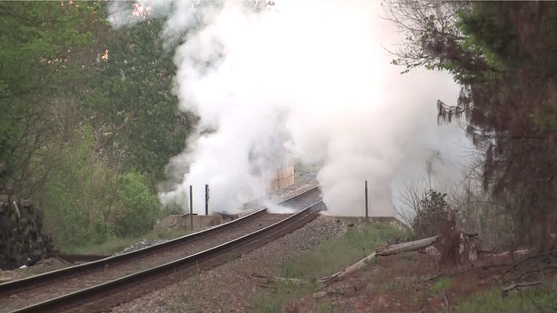 Fire burns under railroad trestle Thursday morning | 11alive.com