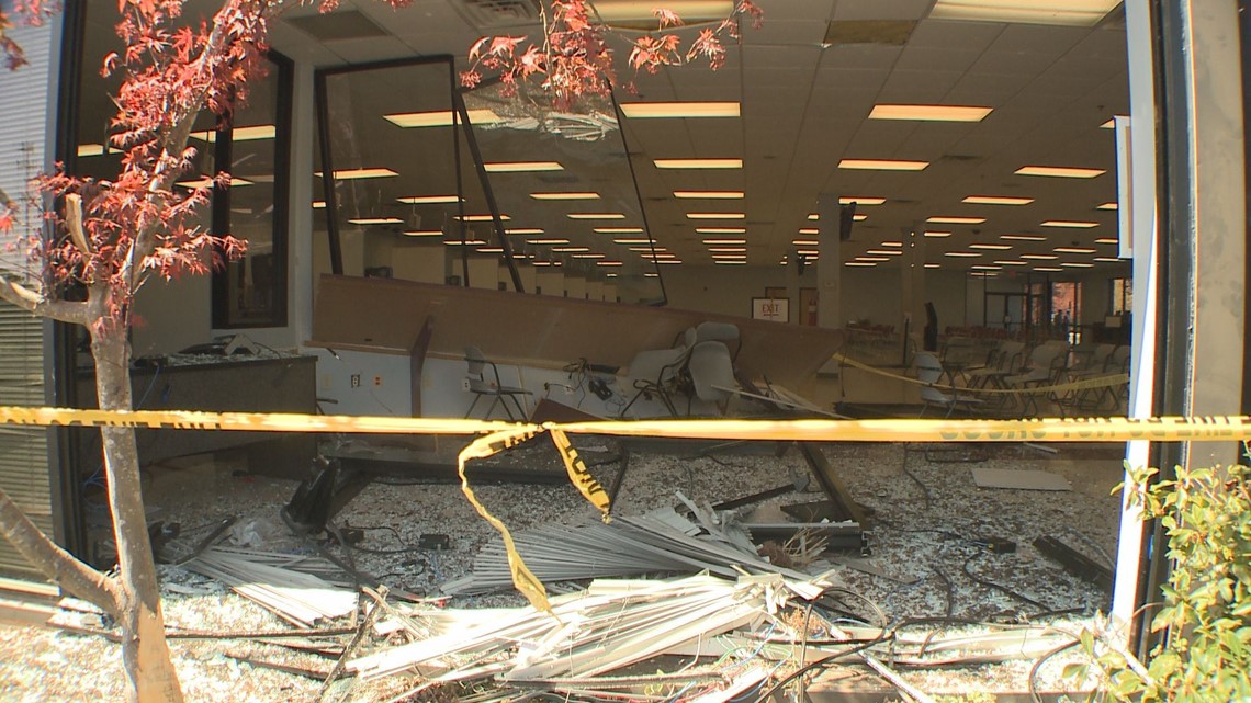 Driver crashes into DMV, sending 2 people to hospital | 11alive.com