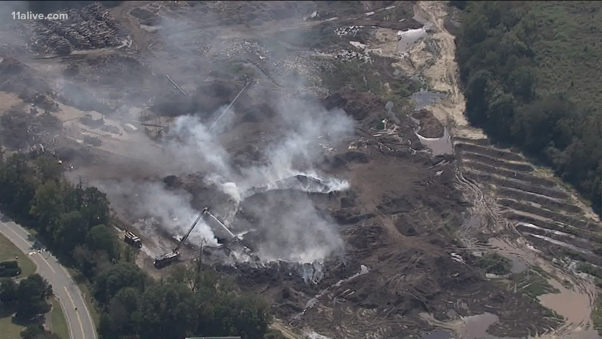 Fire at Coward Mulch Company sends smoke over Barrow County | 11alive.com