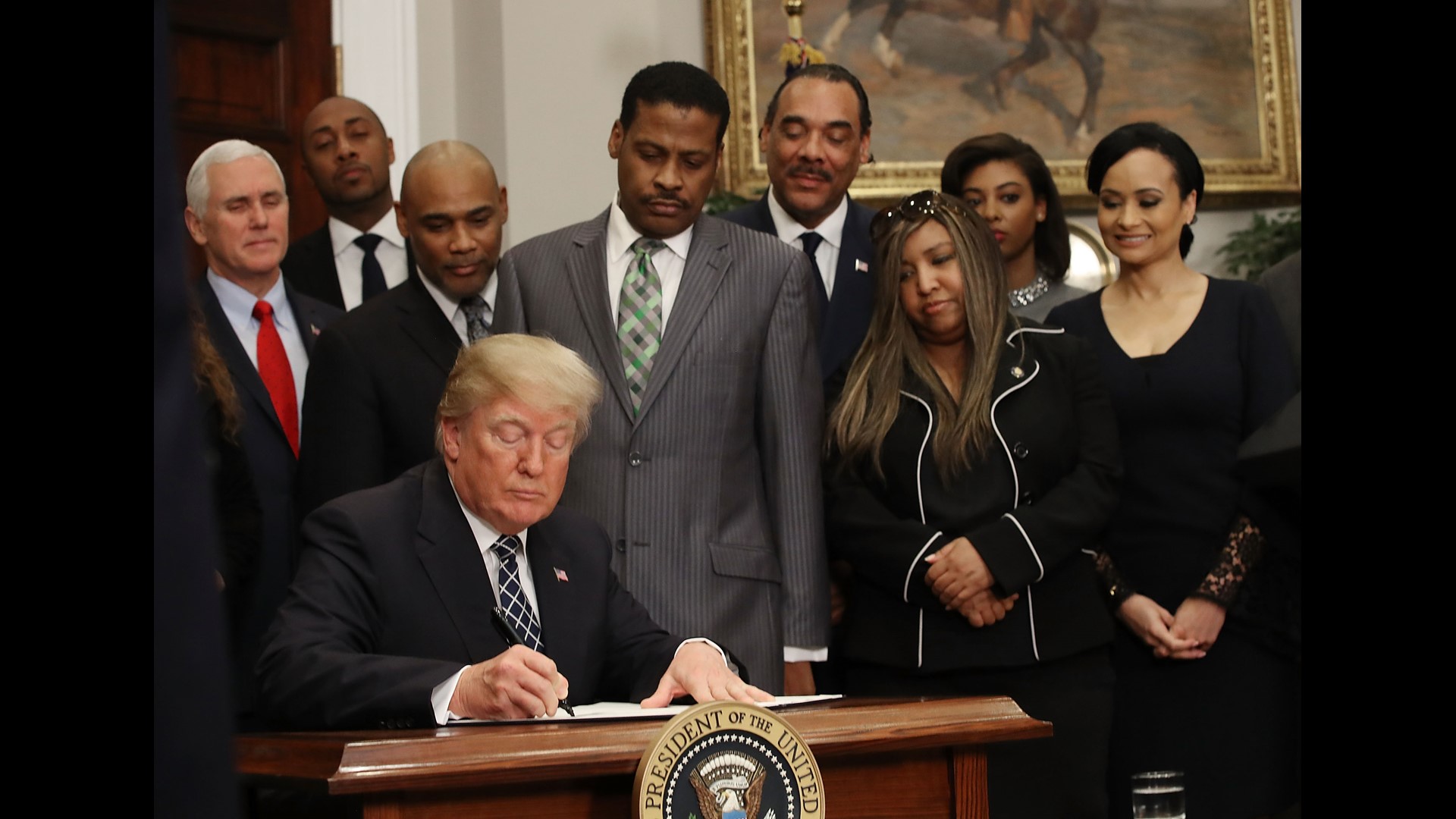 Who was standing next to President Trump at MLK signing? | 11alive.com