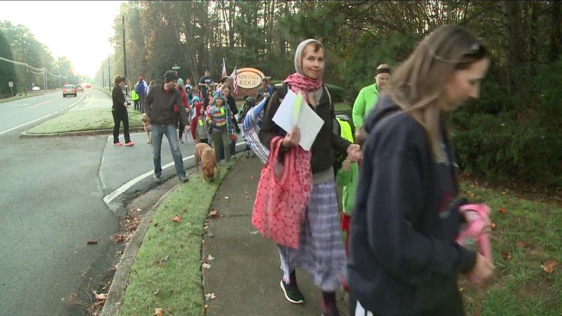 Parents stage walking demonstration to protest re-districting plans ...