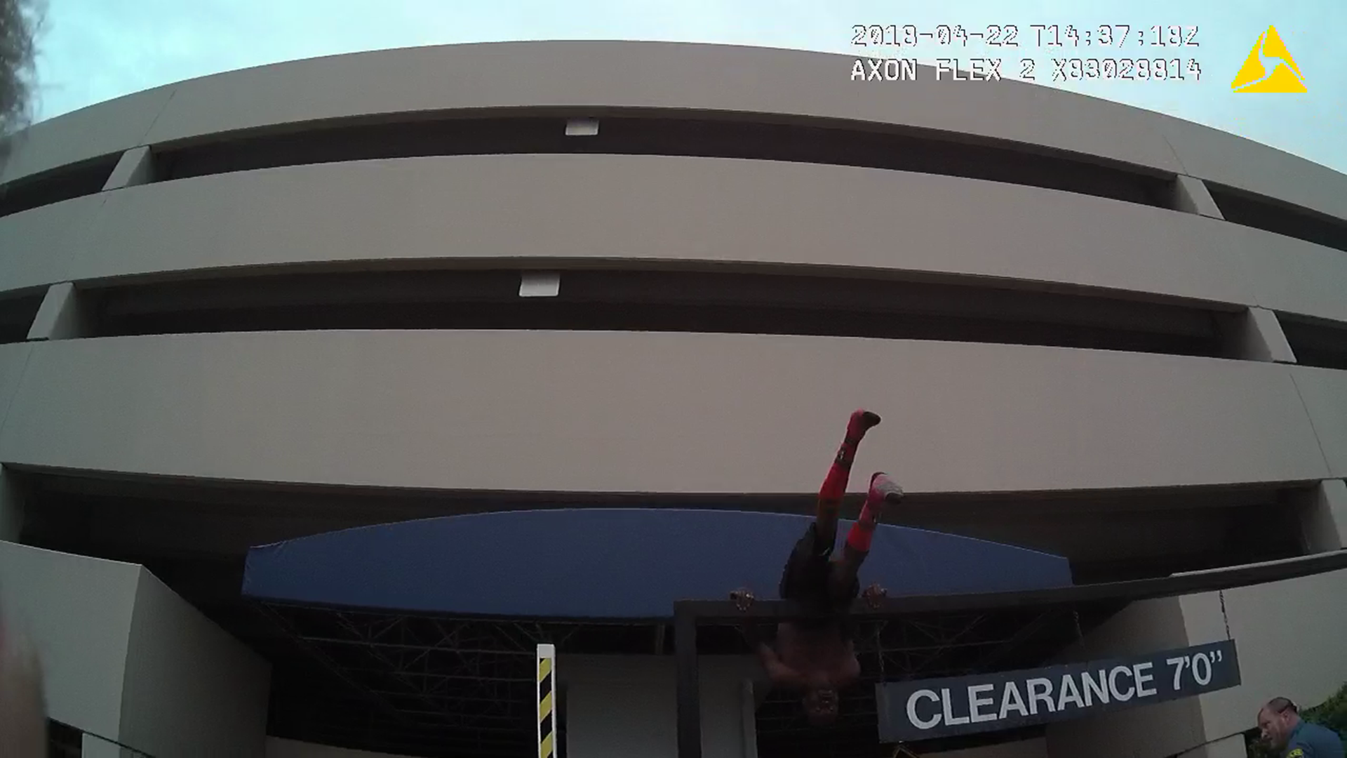 Athens man in custody after mooning officers while on top of parking ...