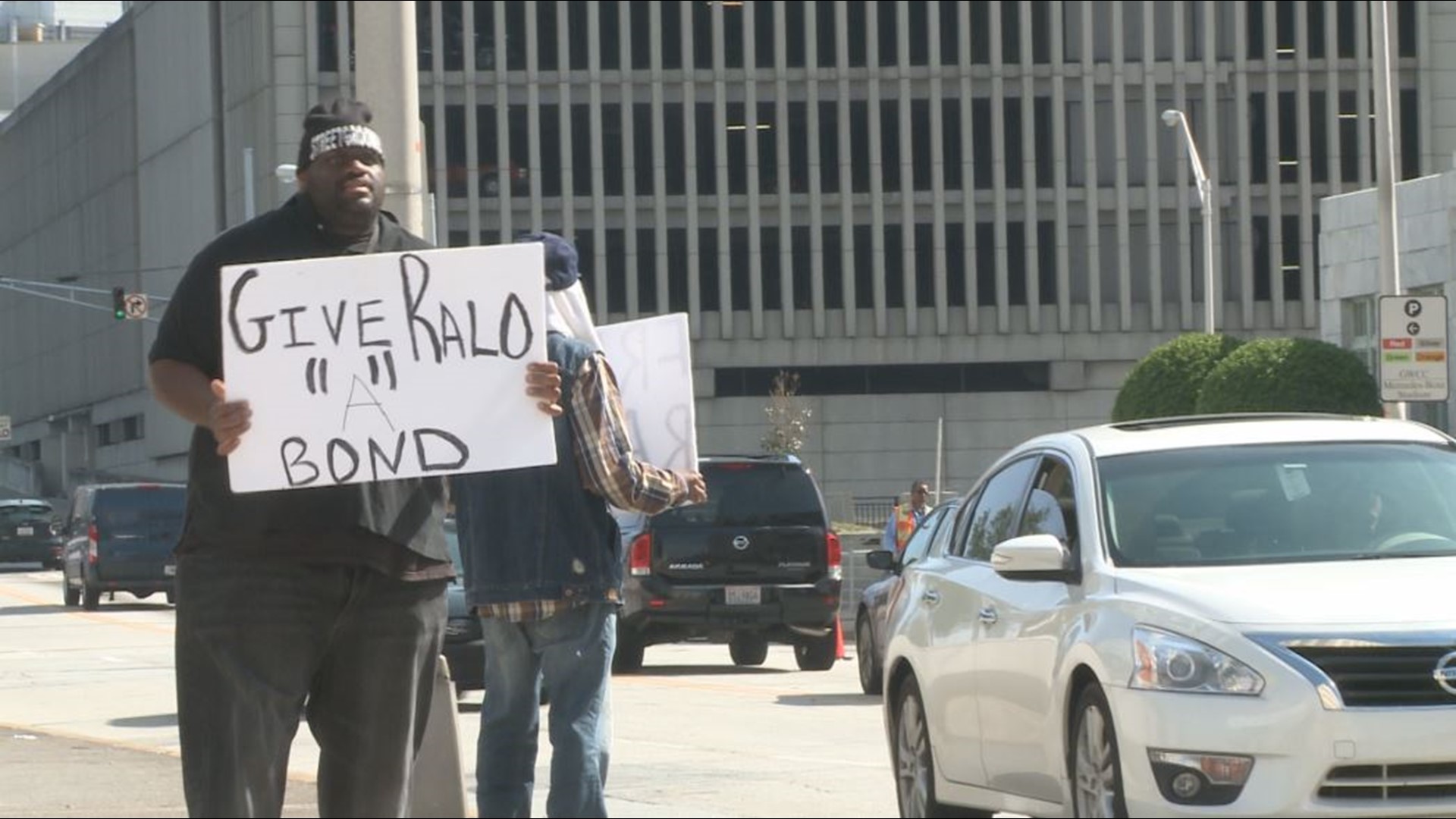 'Where's daddy?' | Family, supporters gather outside courthouse for ...