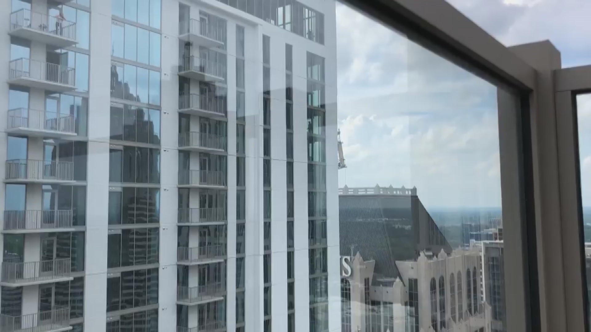 Collapsed window washing platform in Midtown now secured after 2 were ...