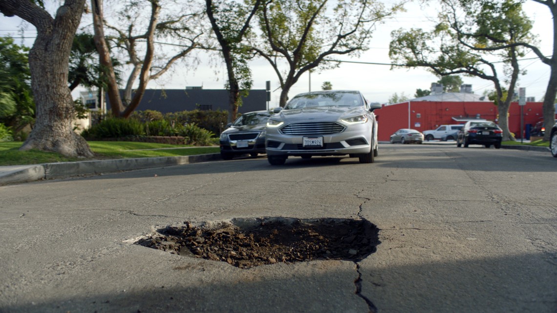 Domino's fixes potholes in Ga. town to keep pizza disasters to a ...
