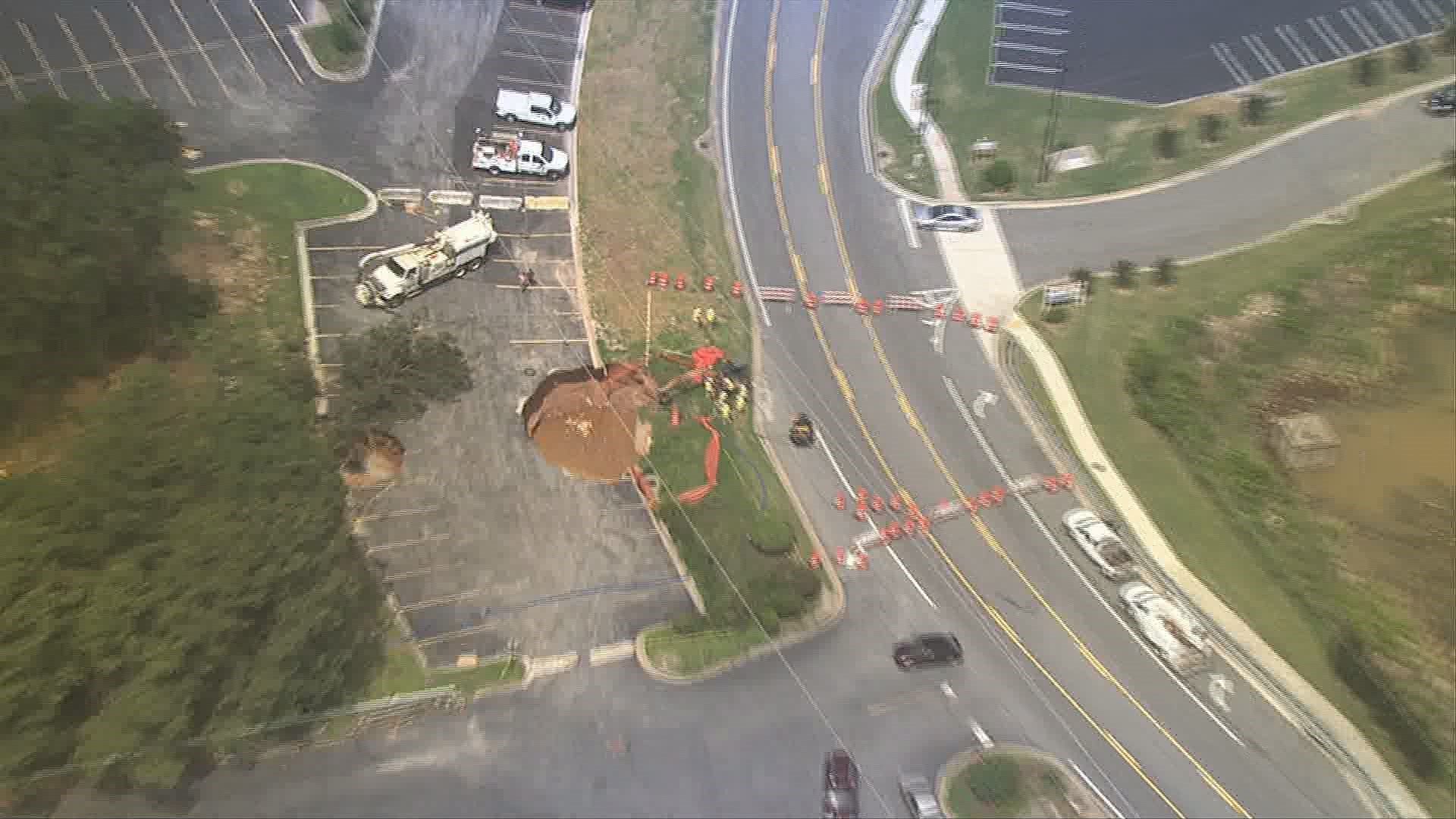 Massive sinkholes destroy metro Atlanta parking lot | 11alive.com
