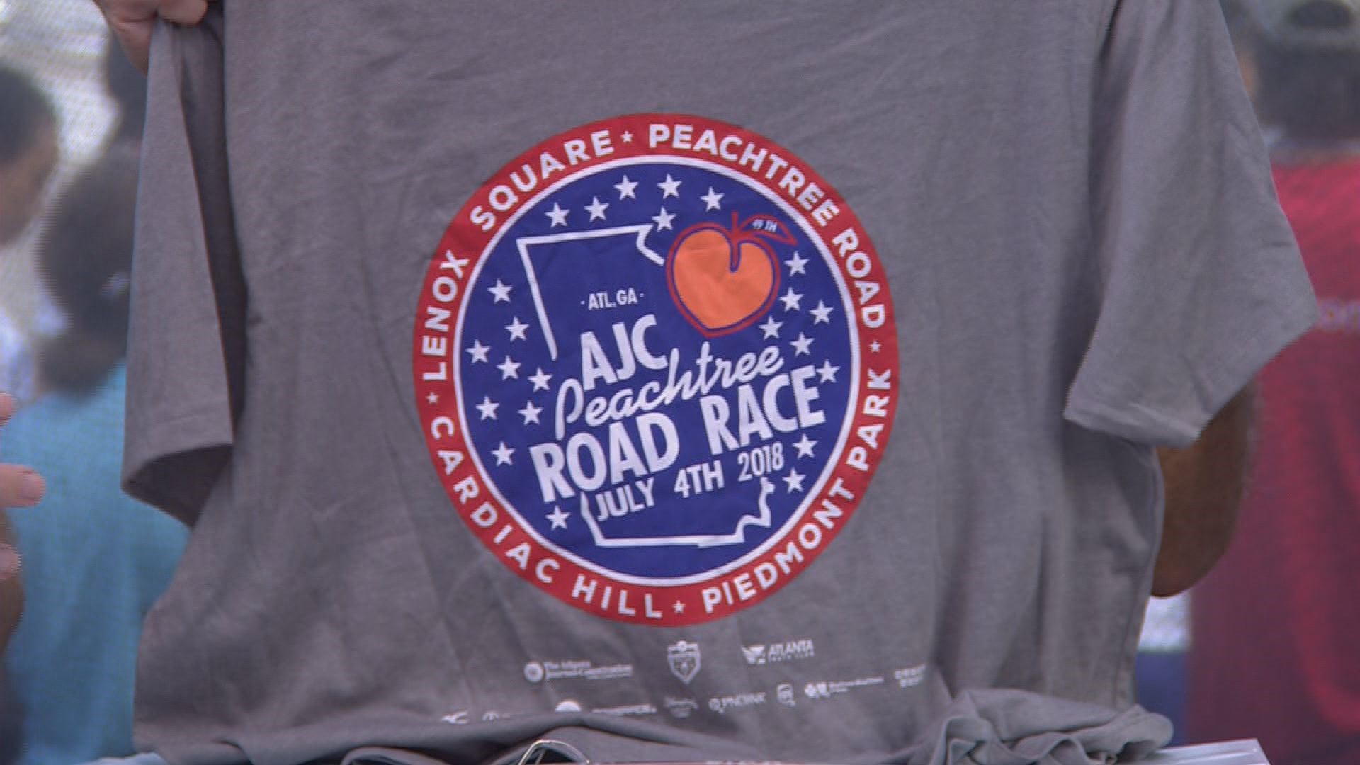 AJC Peachtree Road Race t-shirt design unveiled | 11alive.com AJC Peachtree Road Race t-shirt design unveiled | 11alive.com