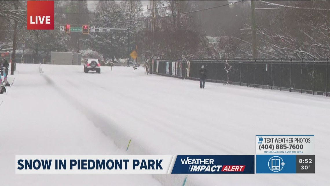 People urged to stay off-roads as heavy snowfall comes down in Midtown ...