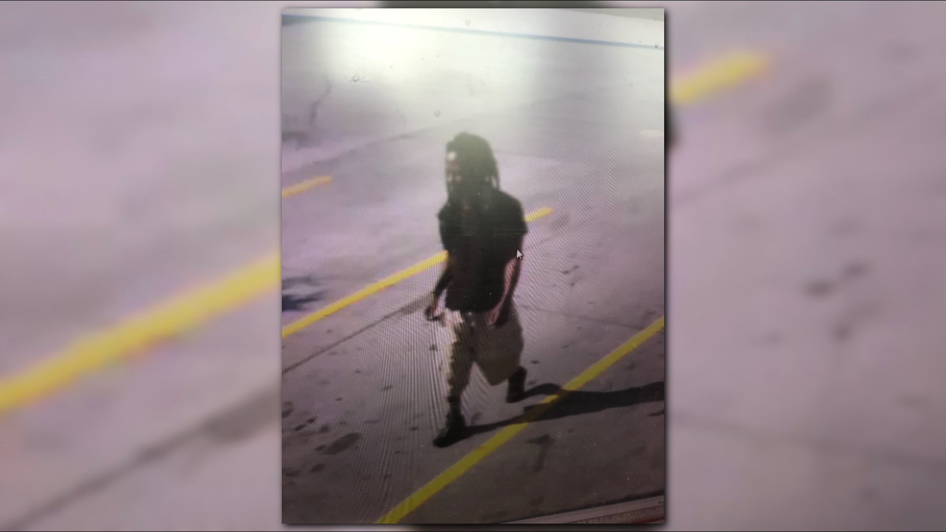 Surveillance video shows robber snatching bag from armored truck ...