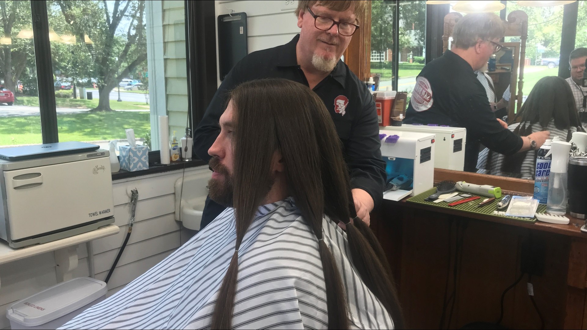 Fayetteville man grows 6 feet of hair over 12 years to help children ...