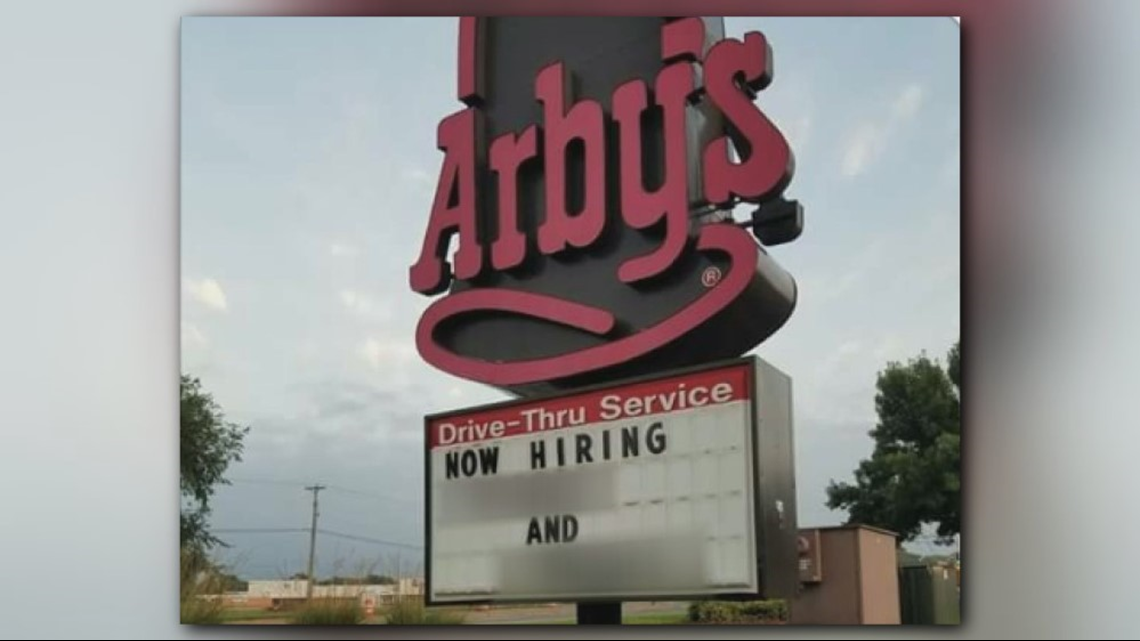 Sign with racial slur and derogatory term sparks discussion | 11alive.com