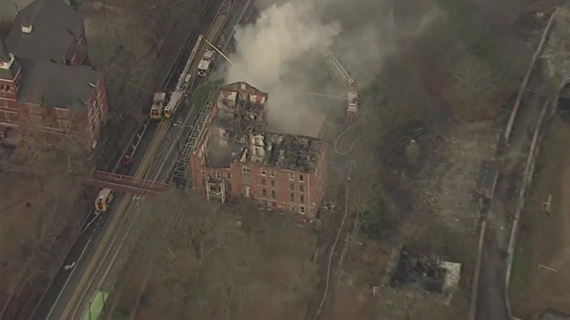 Crews battle large fire at historic building near campus of Morris ...