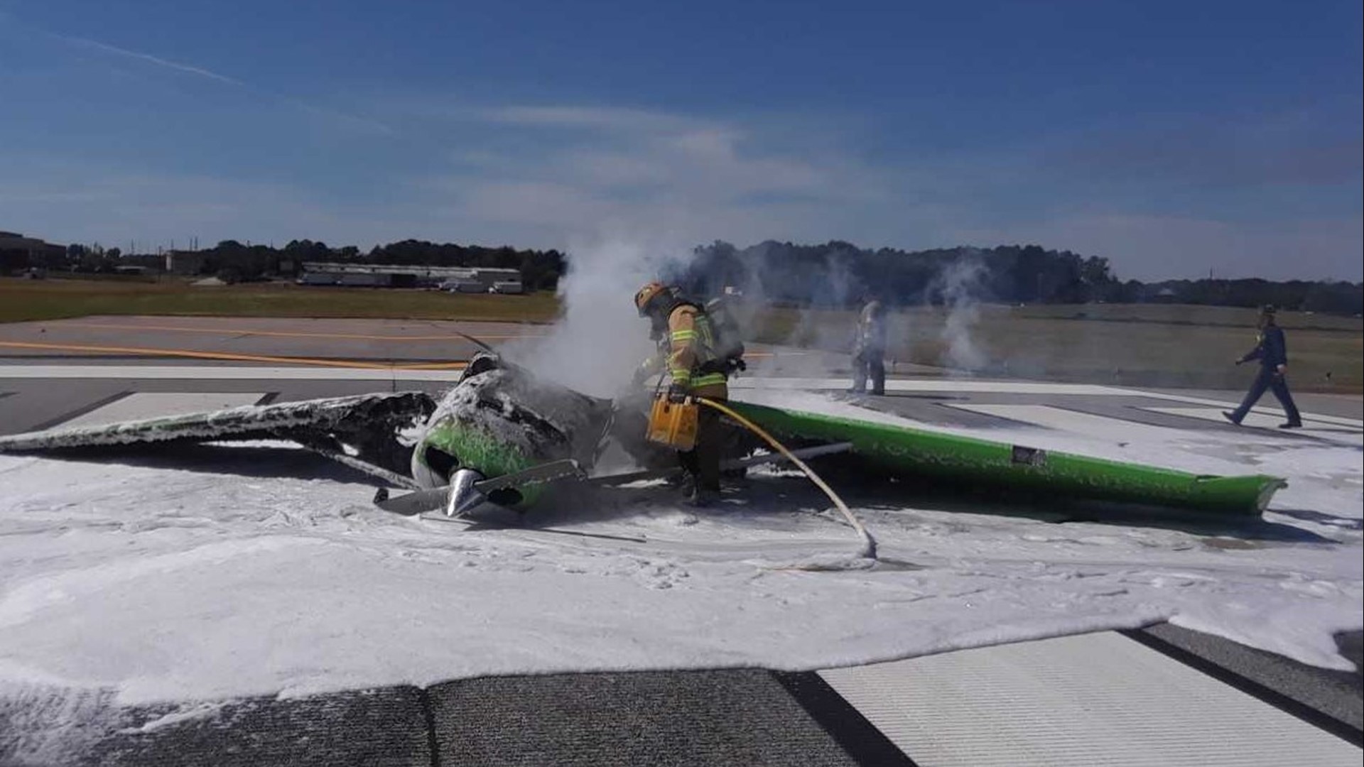 Photos: Fiery plane crash at Briscoe Field | 11alive.com